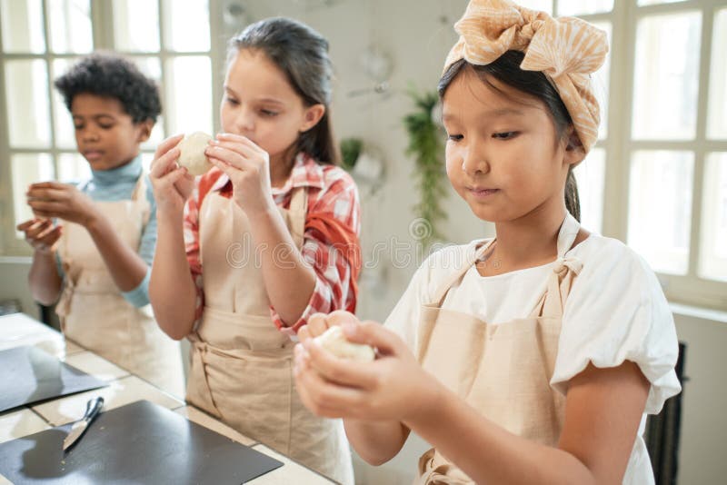 Children Making a Round Shape of Dough Stock Photo - Image of girls ...
