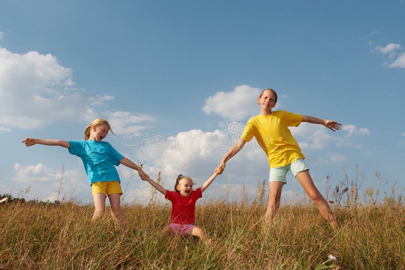 Children on a meadow stock image. Image of bounce, girls - 3104891