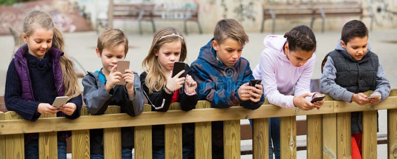 Three Children Talking on Kids Mobile Phone Stock Image - Image of ...