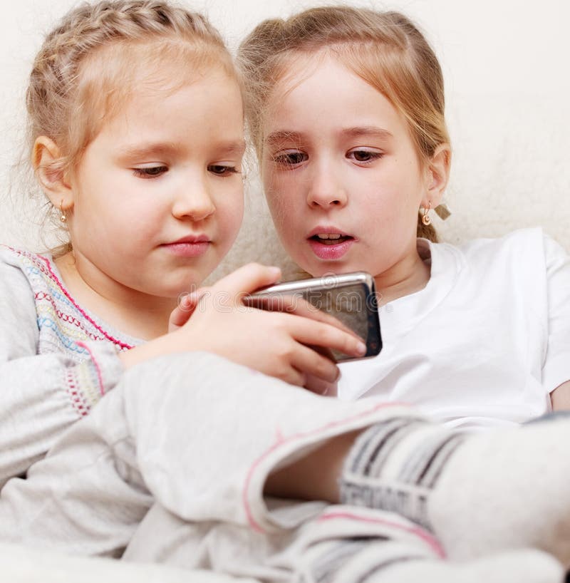 Children with mobile phone stock photo. Image of friends - 28712478