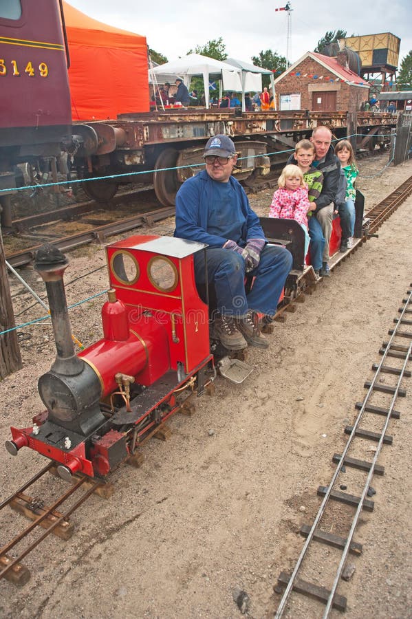 Children`s Steam Locomotive with a Mini Tank Attached in the Park .May ...