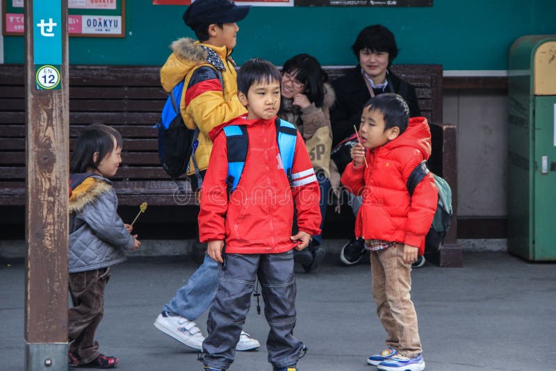 Children with Mom are on the Platform Waiting for the Train. Editorial ...