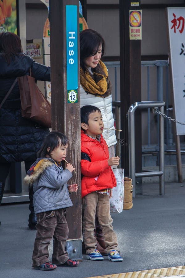 Children with Mom are on the Platform Waiting for the Train. Editorial ...