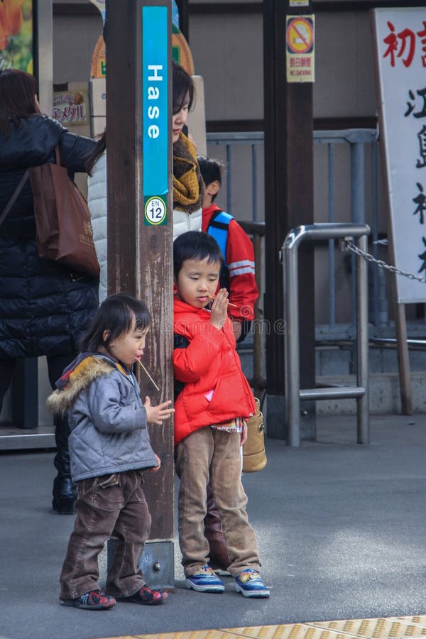 Children with Mom are on the Platform Waiting for the Train. Editorial ...