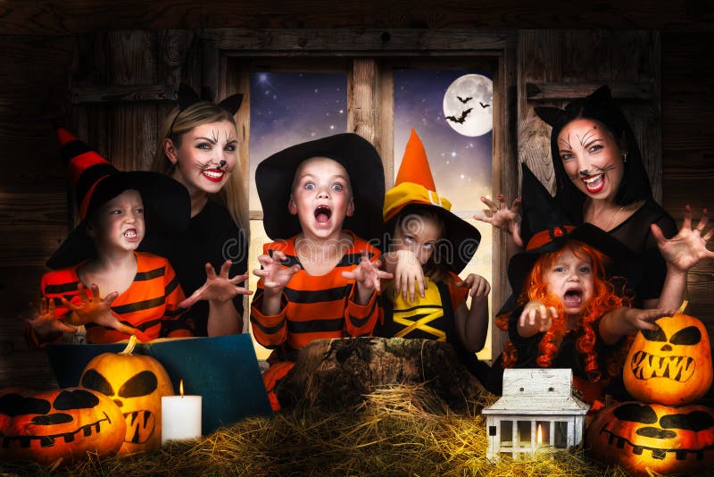 Halloween.Children in Costumes for Halloween Walk in the Woods at Night ...