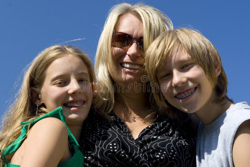 Children with mother stock photo. Image of tender, girl - 1068726