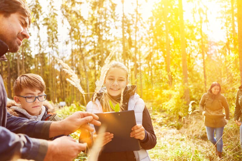 Children in Natural History Lessons in the Forest with Foresters Stock ...