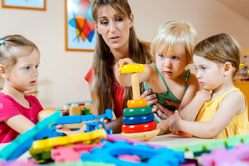 Children in Nursery School Learning and Playing Stock Image - Image of ...