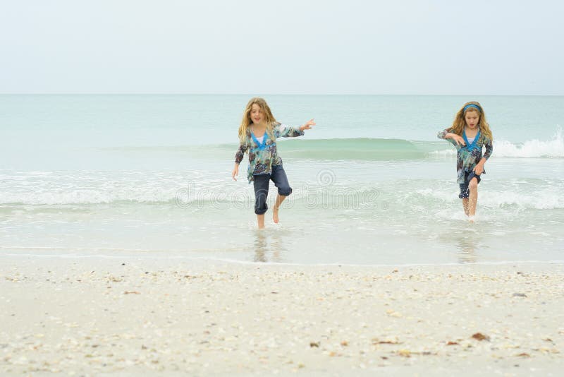 Children in the ocean stock image. Image of people, girl - 14024689