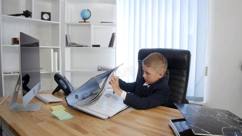 Children in Office Review Documents Stock Photo - Image of boys, girl ...