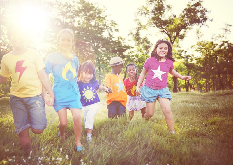 Children Outdoors Playing Cheerful Together Concept Stock Image - Image ...