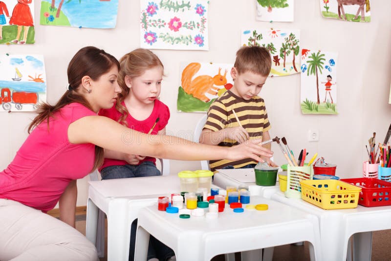 Children Painting with Teacher in Art Class. Stock Photo - Image of ...