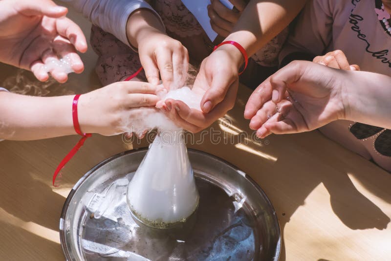 Children Participate in a Chemical Experiment. Foam from a Flask and ...