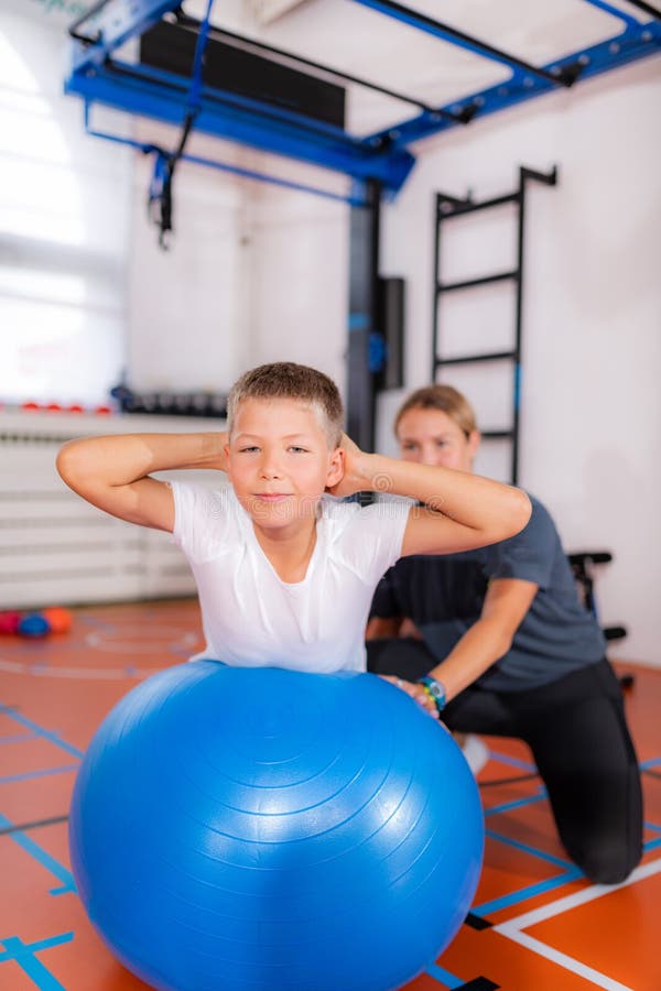 Children during Physical Activity Class, Exercising with Fitness Balls ...