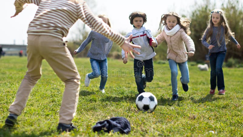 Children Play with Ball Outdoors in Spring Stock Image - Image of ...