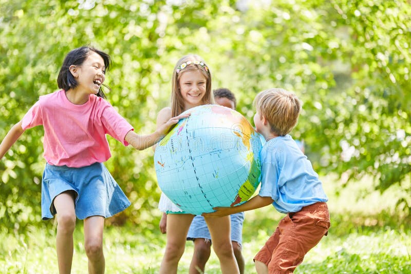 Children Play Ball in Summer with Globe Ball Stock Photo - Image of ...