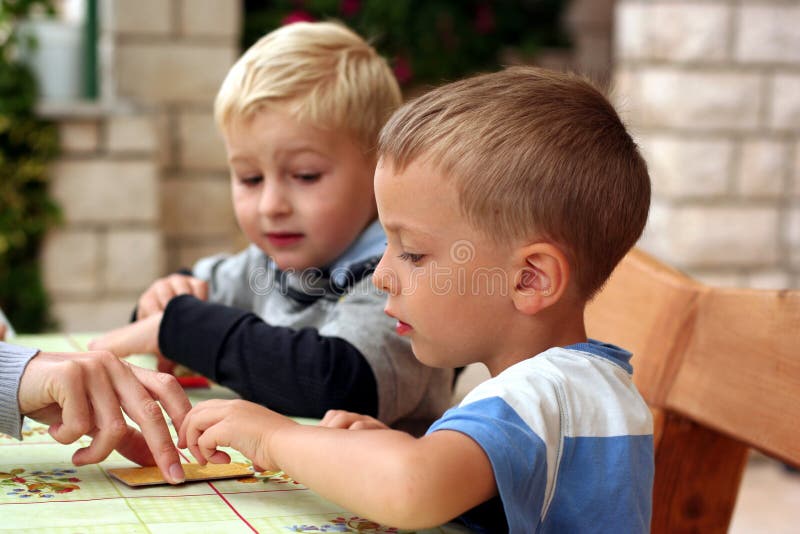 Children play board game stock photo. Image of elementary - 18481400