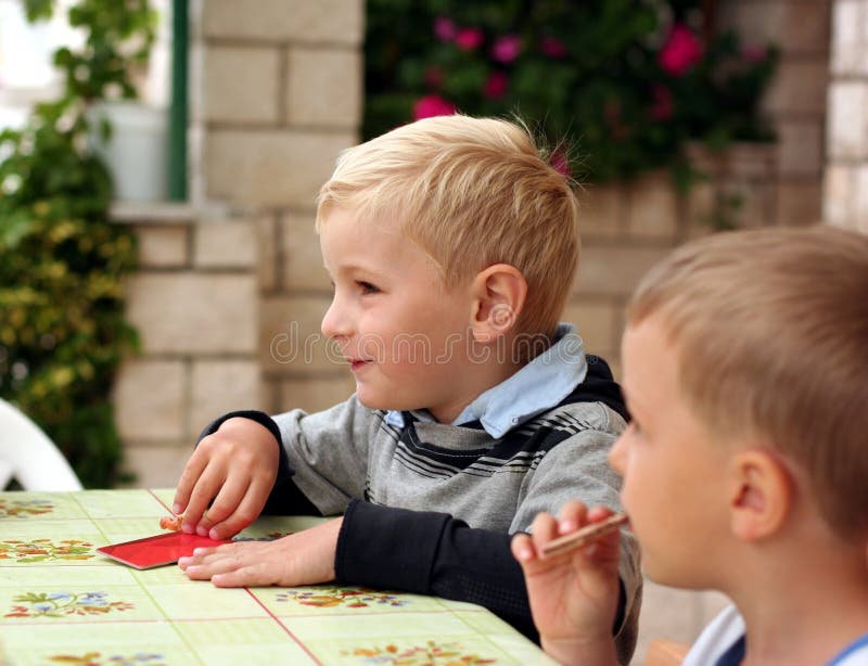 Children play a board game stock image. Image of chance - 19224169