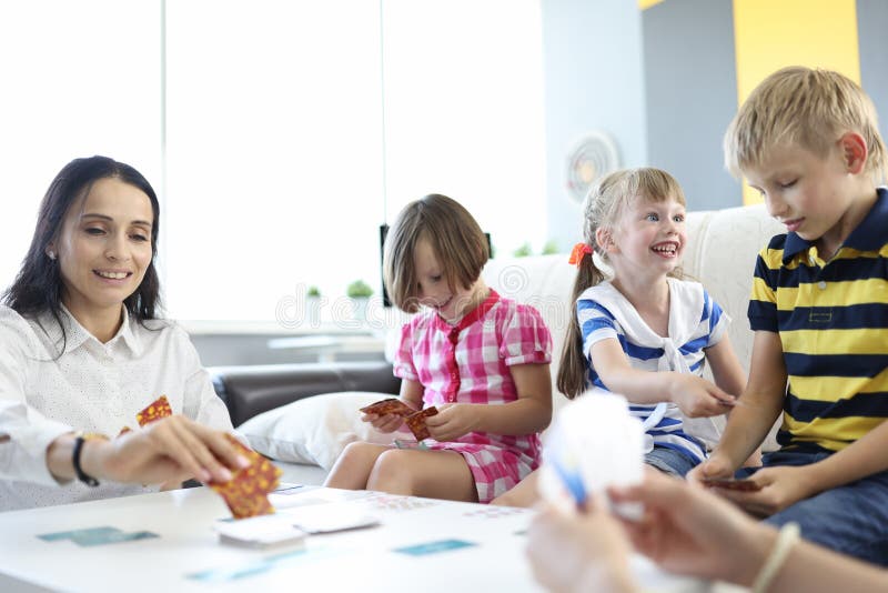 Children Play Board Game with Cards with Mom Stock Photo - Image of ...