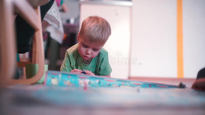Group Children Playing Card Game in City Park. Down Syndrome Boy Holds ...