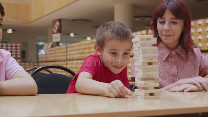 4K. Children Play a Board Game in the Library Stock Footage - Video of ...