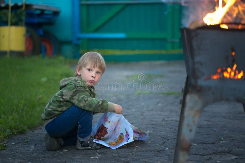Children Play with Fire in the Grill Stock Image - Image of barbecue ...