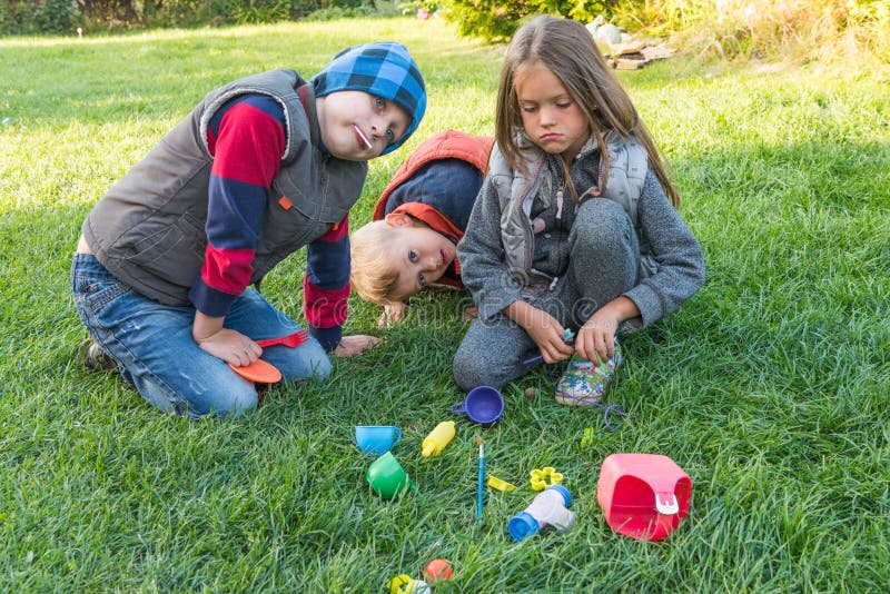 Children Play in the Garden on the Grass. Stock Image - Image of green ...