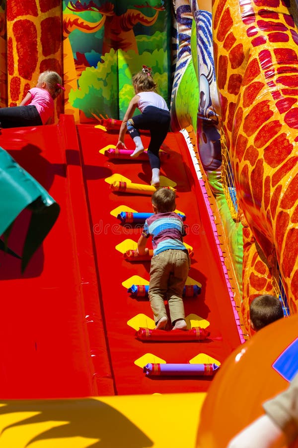 Children Play on the Inflatable Children`s Playground Editorial Stock ...