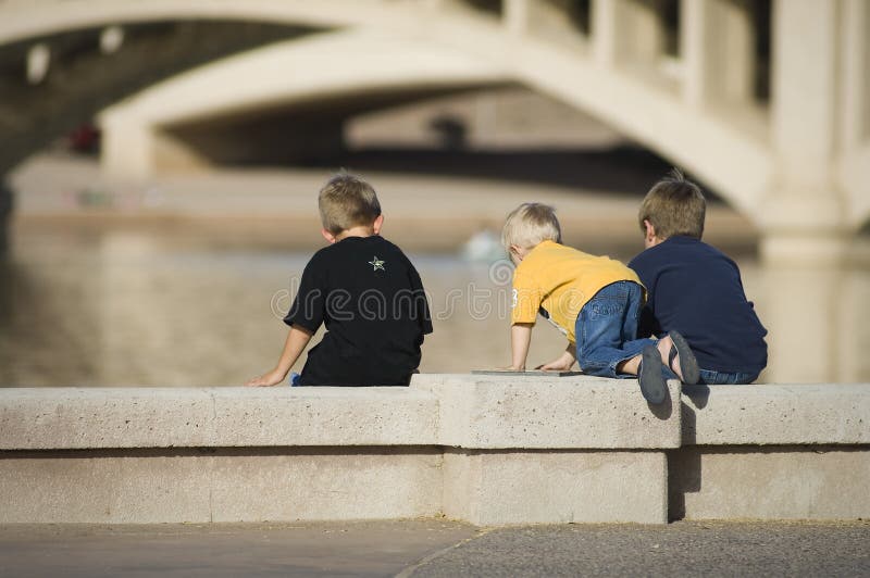 Children Play at Inner City Lake Stock Photo - Image of alone ...