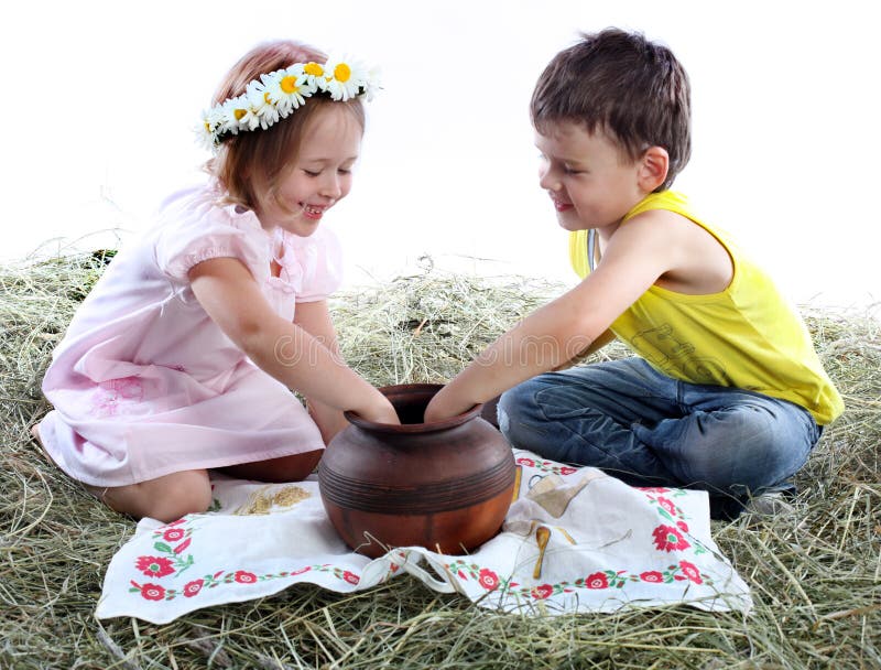 Children play with a jug stock image. Image of eating - 25402625