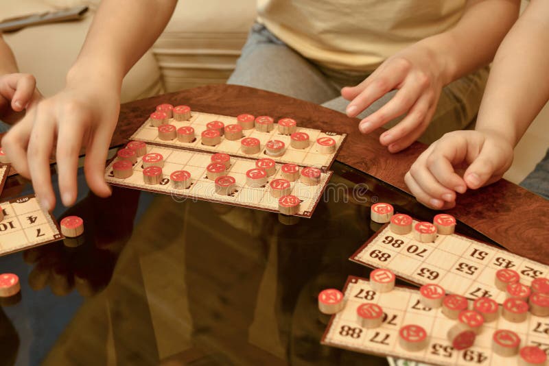 Children Play Loto and Cover the Fields on the Card with Chips W Stock ...