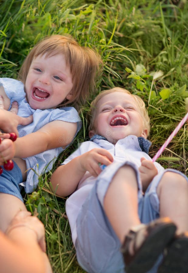 Children play in nature stock image. Image of children - 98770851