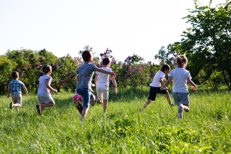 Children Play Outdoors Running and Having Fun Stock Photo - Image of ...