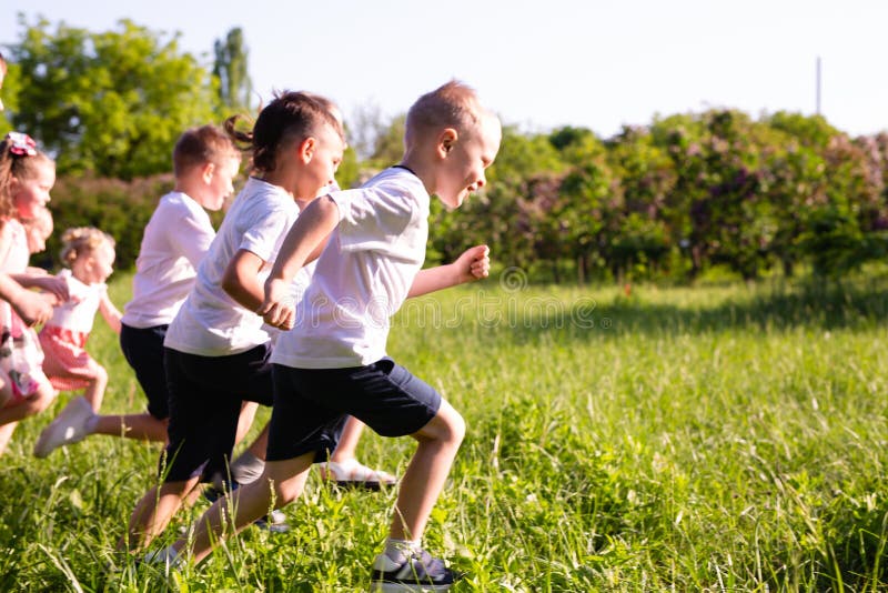 Children Play Outdoors Running and Having Fun Stock Image - Image of ...