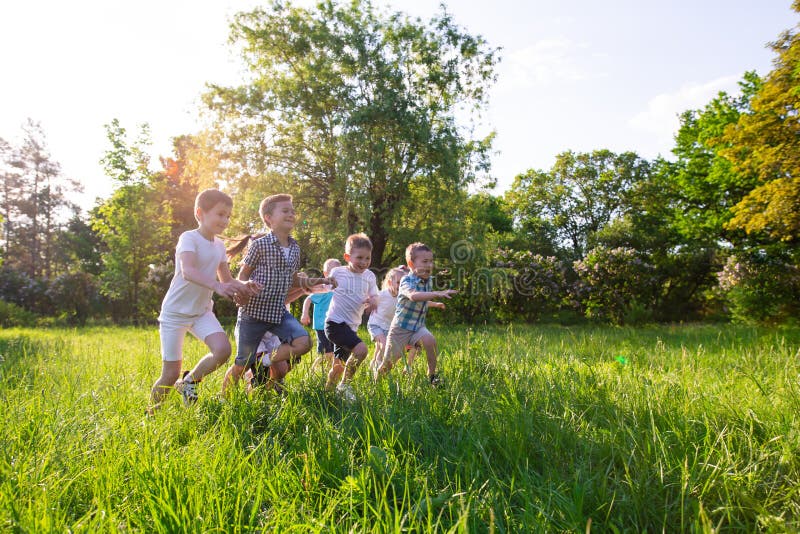 Children Play Outdoors Running and Having Fun Stock Image - Image of ...