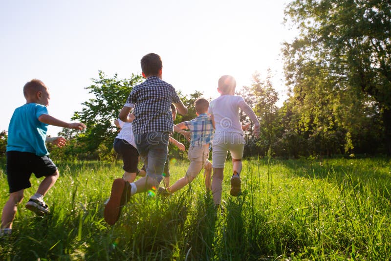 Children Play Outdoors Running and Having Fun Stock Image - Image of ...