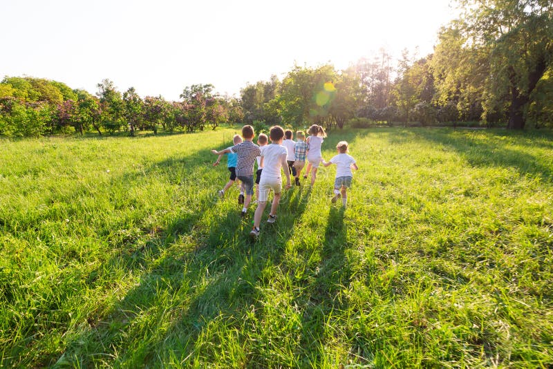 Children Play Outdoors Running and Having Fun Stock Photo - Image of ...
