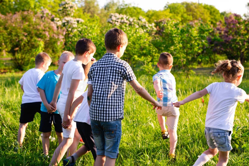 Children Play Outdoors Running and Having Fun Stock Photo - Image of ...