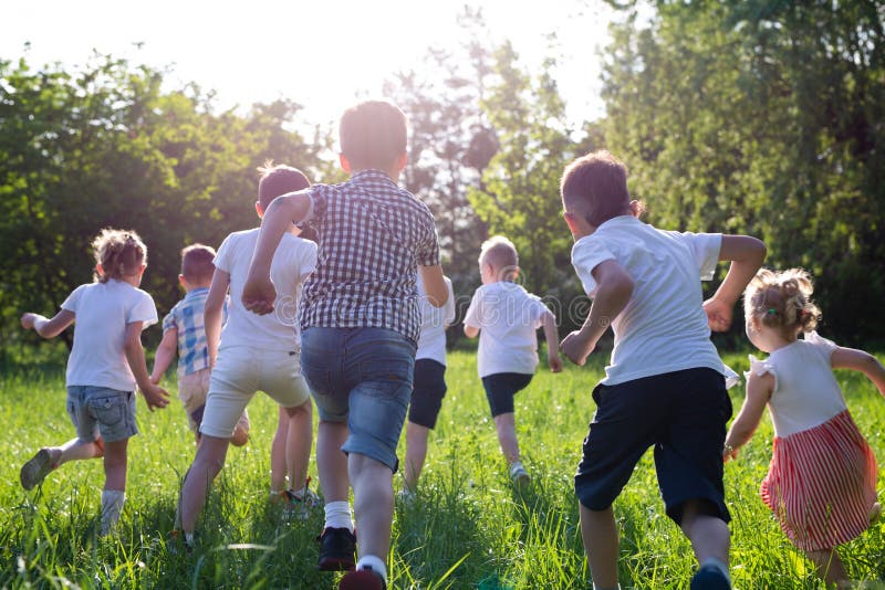 Children Play Outdoors Running and Having Fun Stock Photo - Image of ...