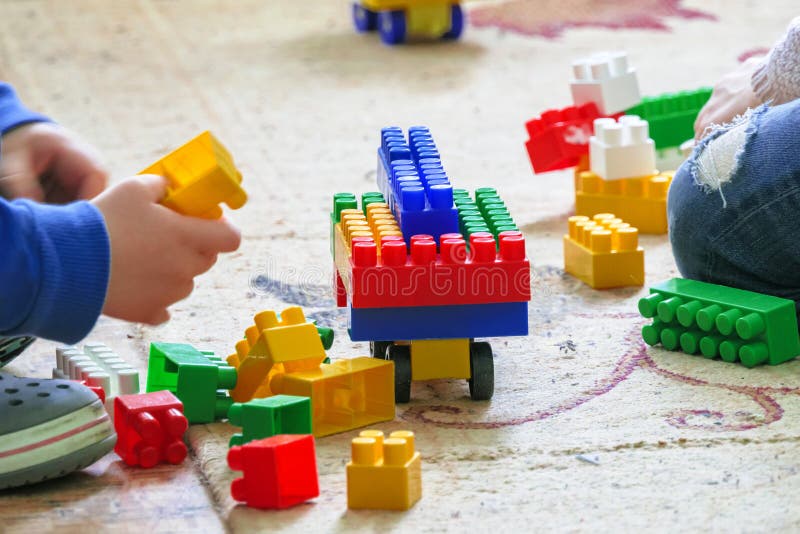 Children Play with a Plastic Designer Stock Image - Image of building ...