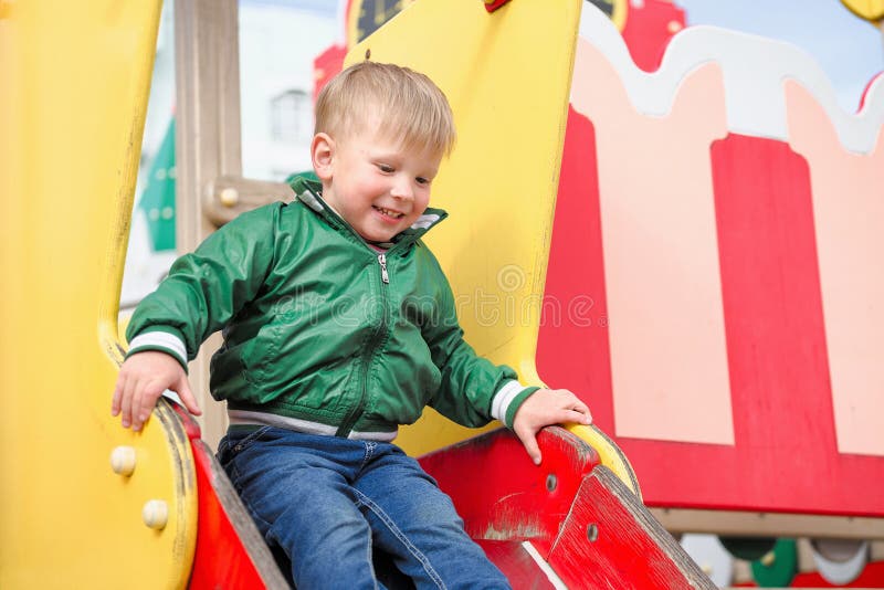 Children Play on the Playground. Early Spring Stock Photo - Image of ...