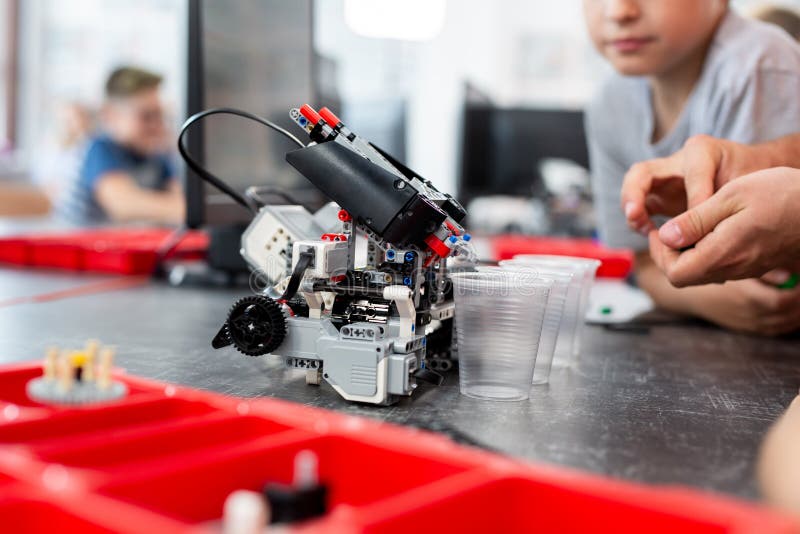 Children Play with a Robot in a Robotics Class. Stock Photo - Image of ...