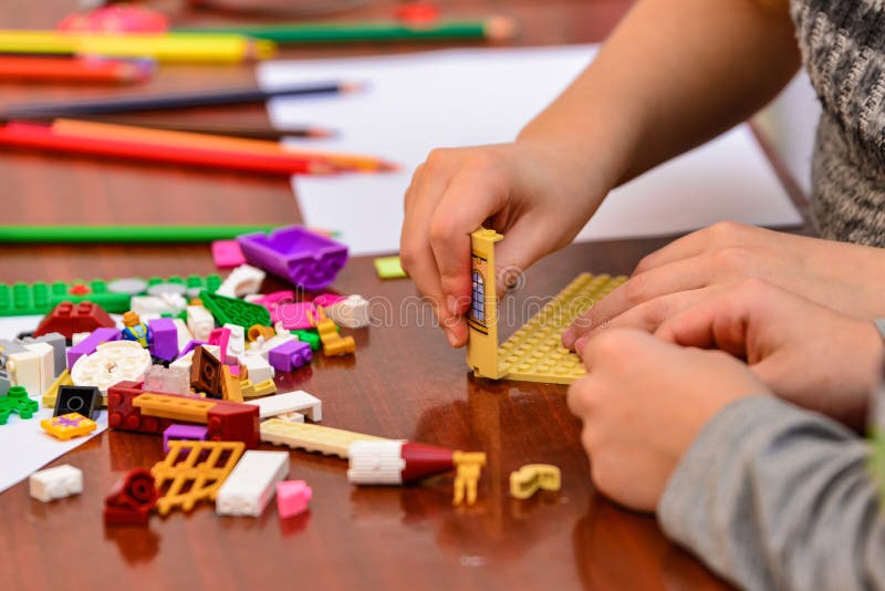 Dad and Son Build Figures from the Constructor. Spending Time Together ...