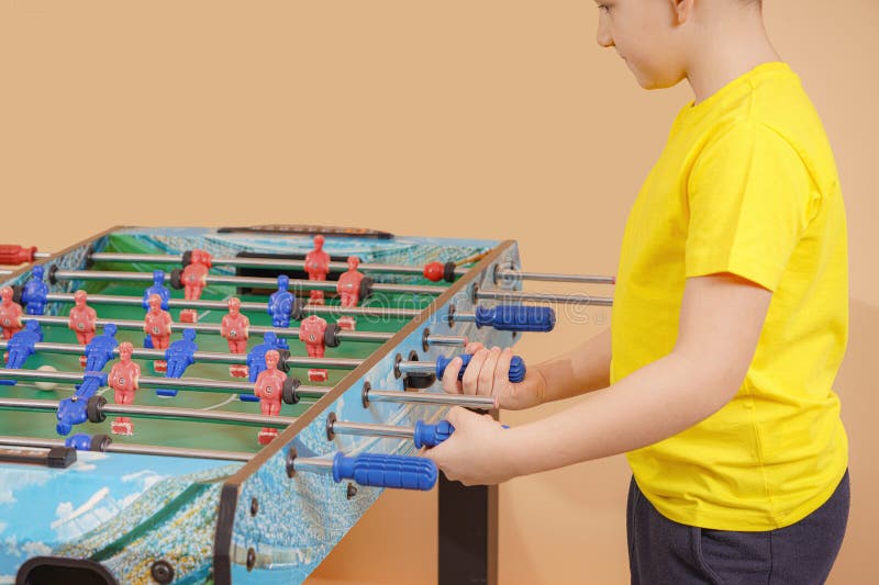 Children Play Table Football Stock Photo - Image of family, cheerful ...