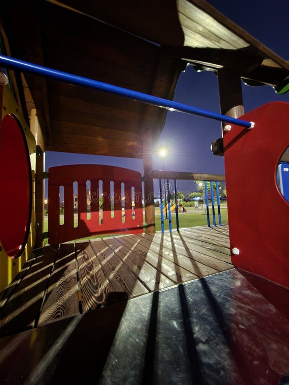 Children Playground at Night Stock Photo - Image of vehicle, building ...