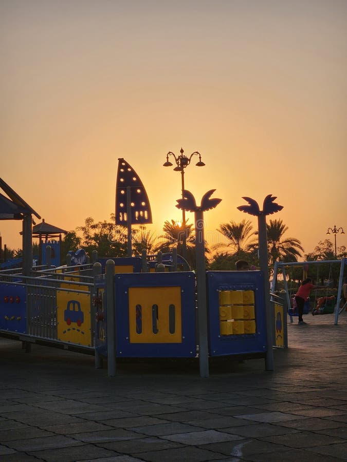 Children Playground at Sunset Stock Photo - Image of yellow, light ...