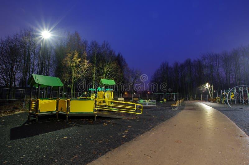 Children Playground at Night Stock Photo - Image of entertainment, blue ...