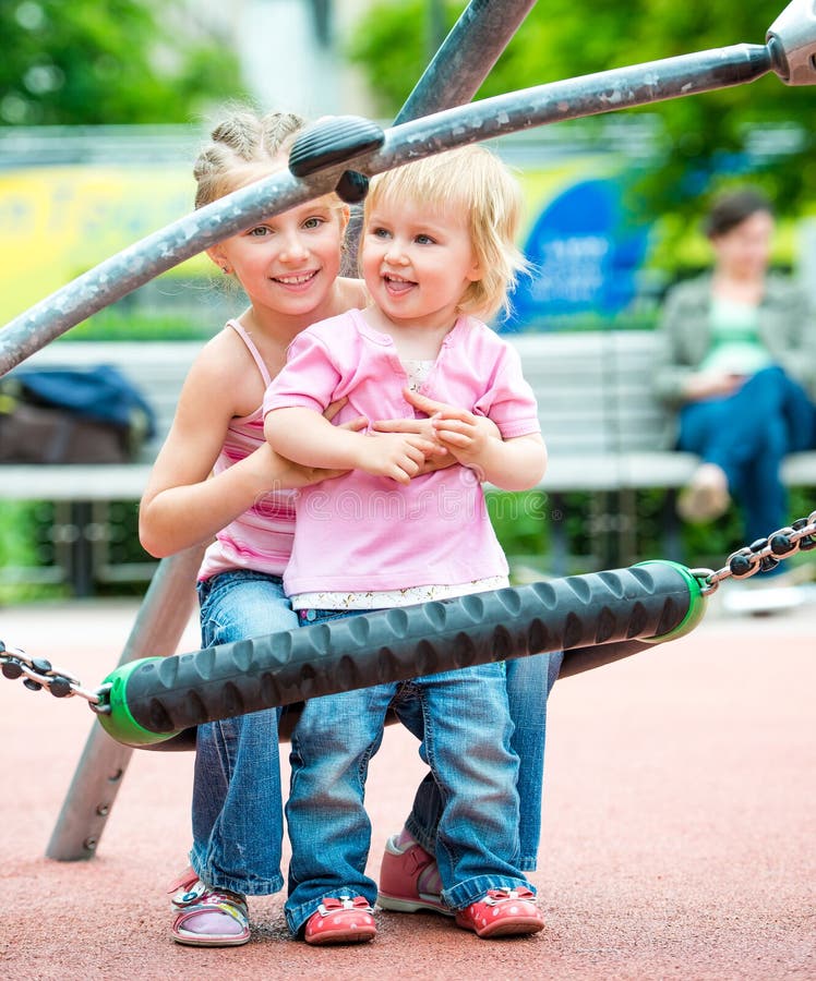Children at the playground stock image. Image of female - 45341815