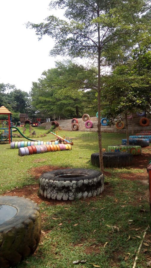 Children Playground between Tree Stock Image - Image of tree, city ...