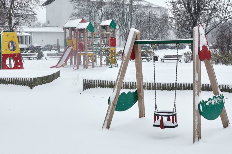 Children Playground in Winter Snow Covered Snowfall Stock Photo - Image ...